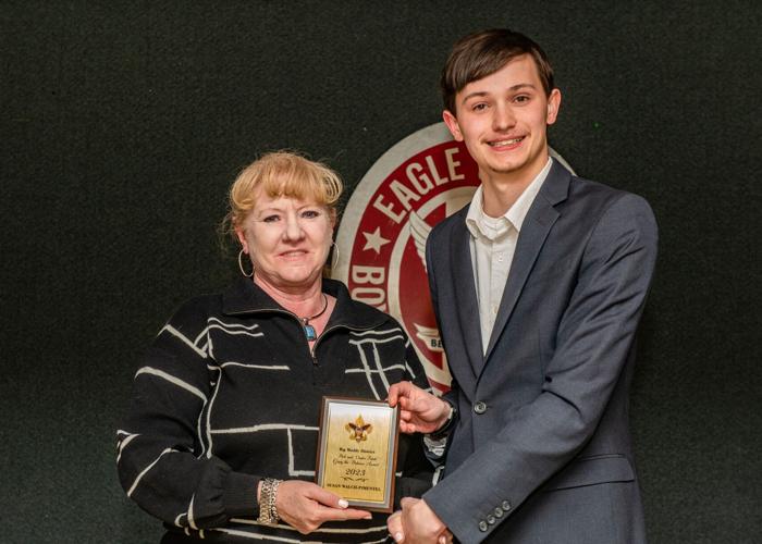 Susan Walch-Pimentel gets the Going the Distance Award from the Boy ...