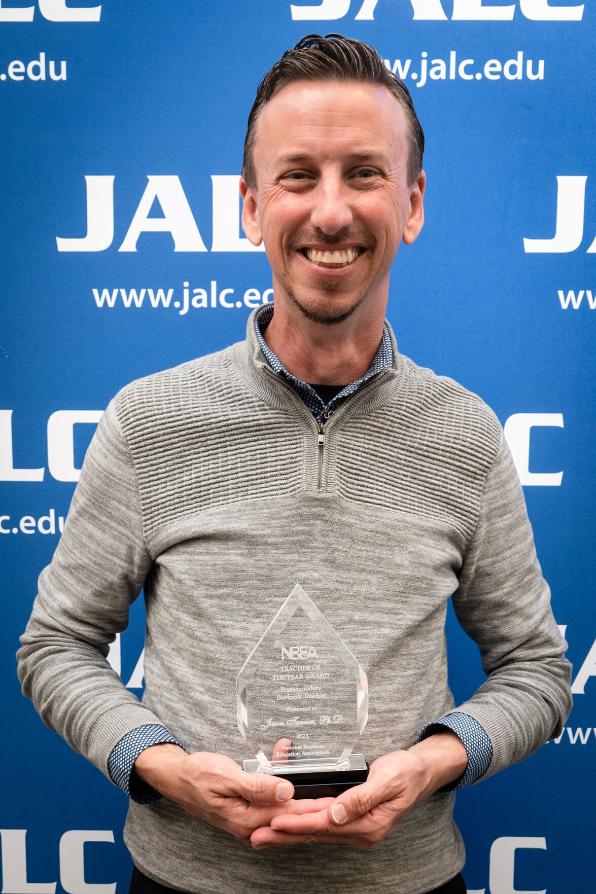 John A. Logan's Jason Tanner wins national business education award ...