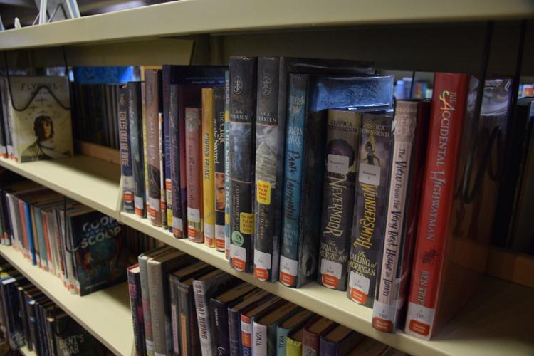 Local library director touts benefits to having a library card | Latest ...