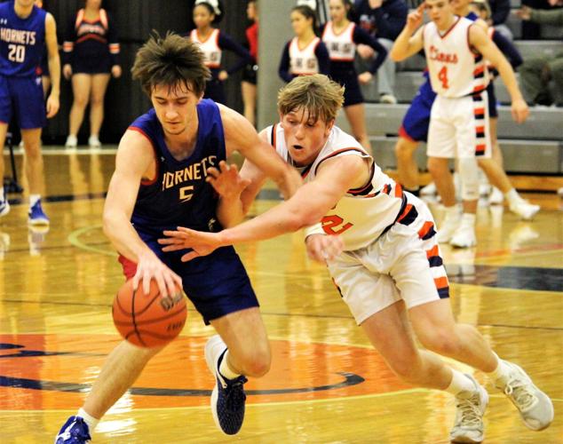 Boys Basketball | Carterville holds on to beat Nashville | High School ...