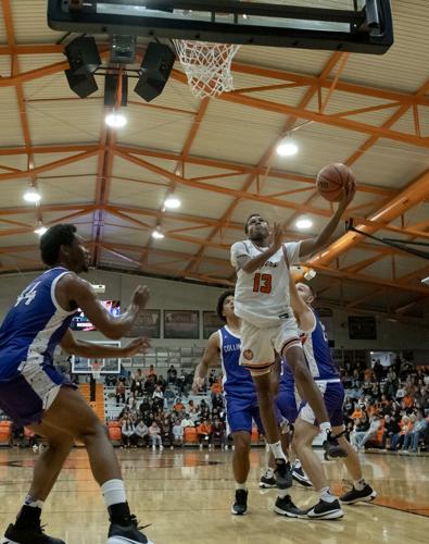 Boys Basketball | Collinsville gets past Herrin in opener | High School ...