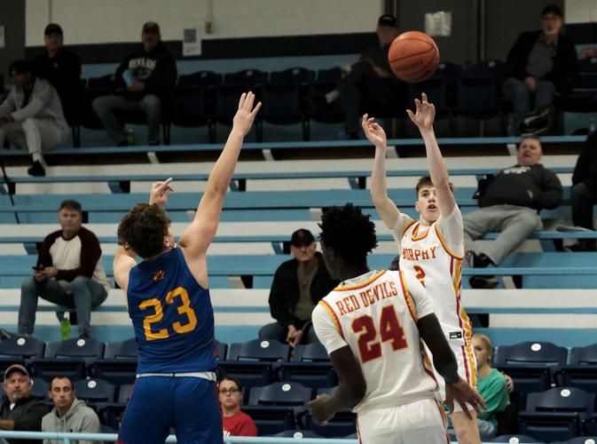 Boys Basketball | Murphysboro defeats Roxana at Duster Thomas ...