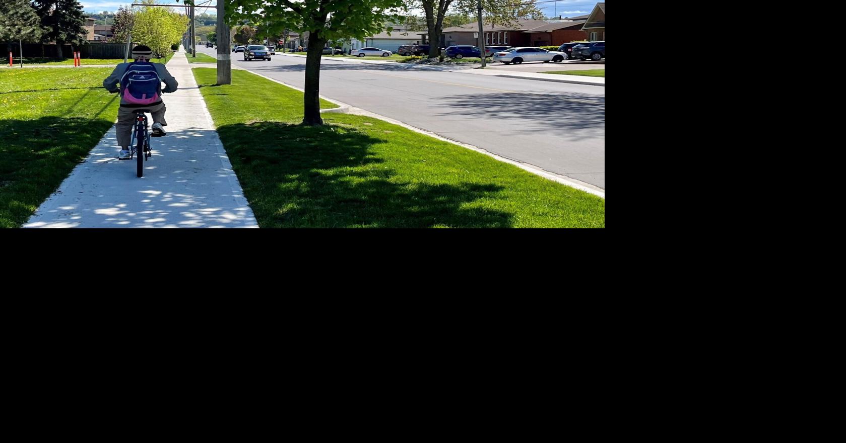 Protected bike lanes on Dewitt Road scrapped after debate