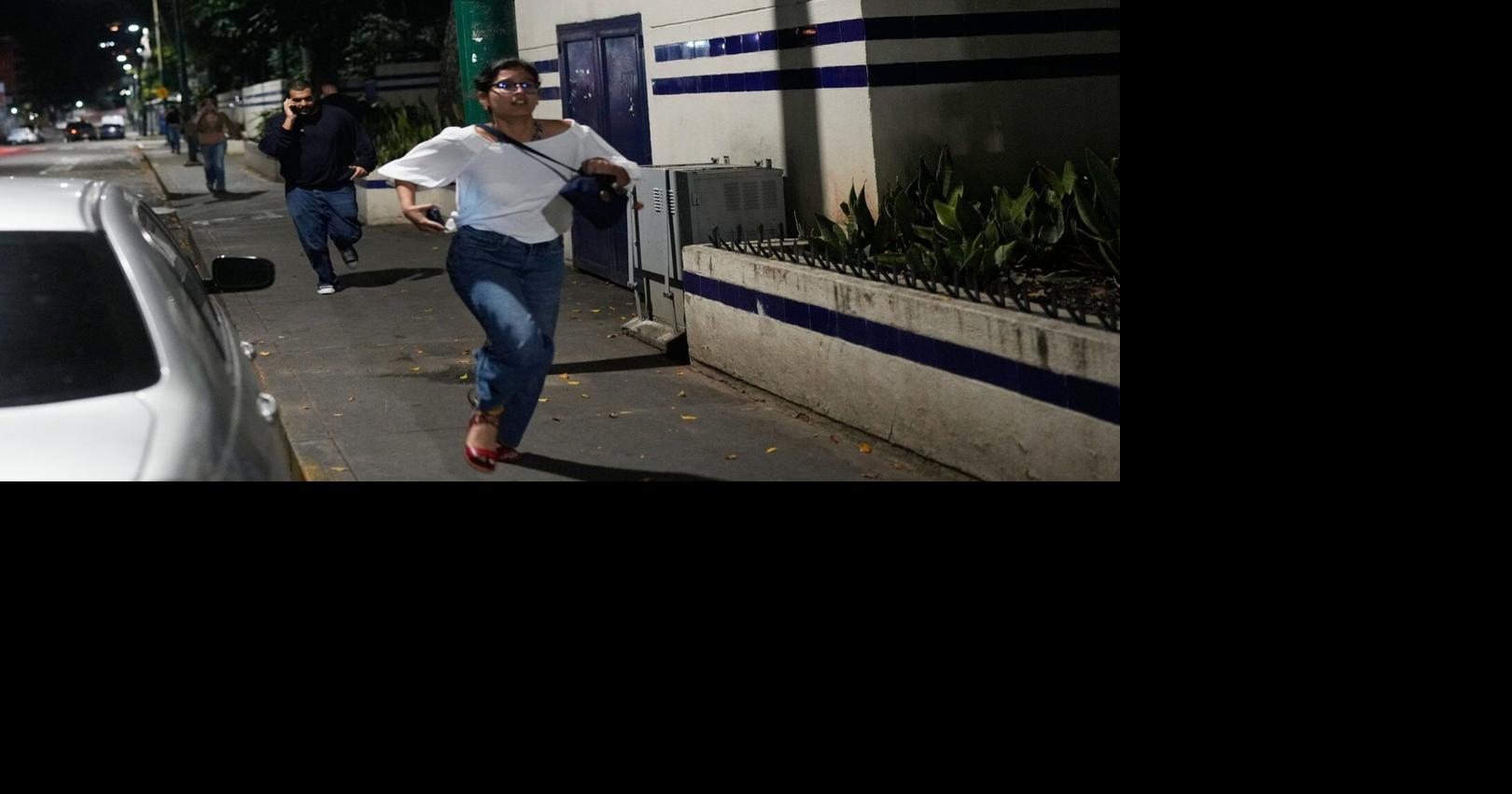Behind the photo: How a woman running from US bombs in Venezuela ...
