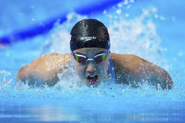 Chinese 12-year-old swimmer Yu Zidi makes her debut on world stage ...