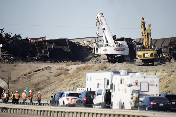 Truck driver killed when train derailment collapses Colorado bridge ...