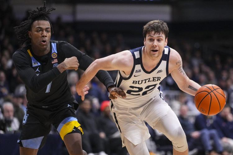 Stevie Mitchell has career night as No. 9 Marquette overcomes foul ...