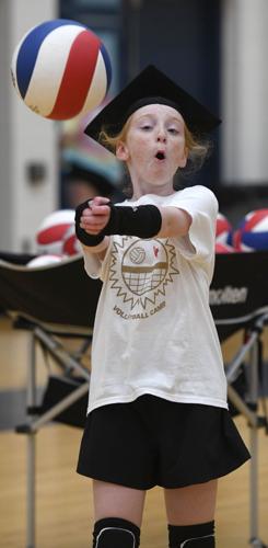 Funny hats, glasses worn at Mountain Volleyball Program camp
