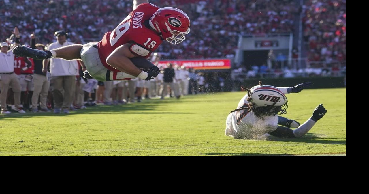 Beck throws and runs for TDs to launch new era as No. 1 Georgia rolls past UT-Martin 48-7