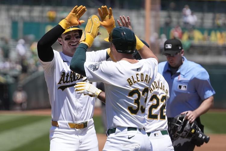 Rooker, Butler each drive in 3 runs in the Athletics' 8-2 victory over ...