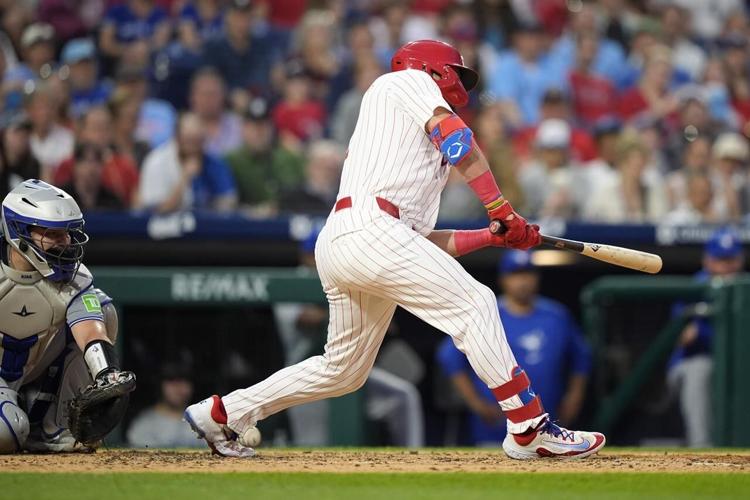 Harper hits grand slam, streaking Phillies rout Blue Jays 10-1