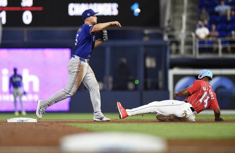 Corey Seager extends hitting streak to 14 games, Rangers beat Marlins 7-0