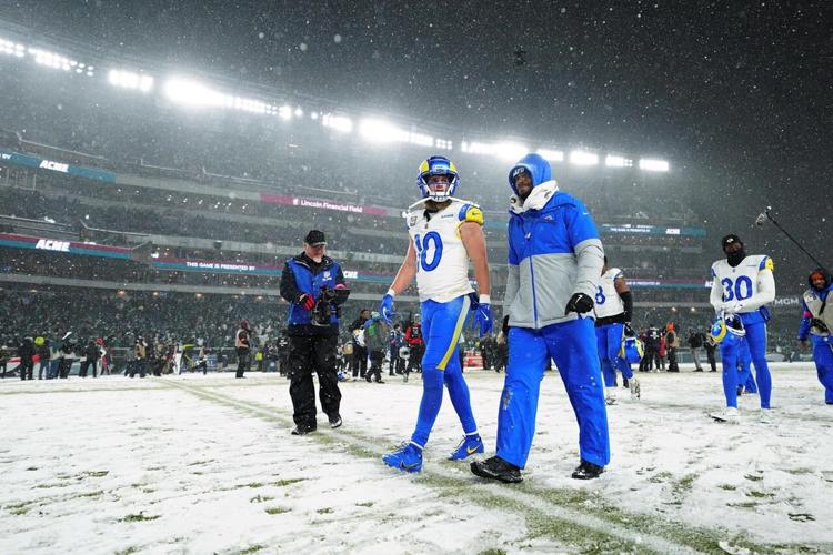 Rams' fumbles in the snow derail playoff upset bid in Philadelphia