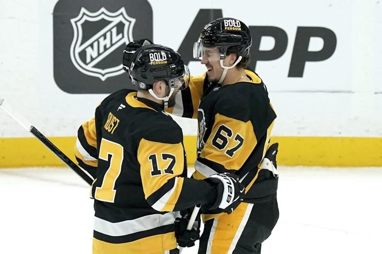 Crosby ties Lemieux's franchise assists record, leads Penguins past Flyers 7-3