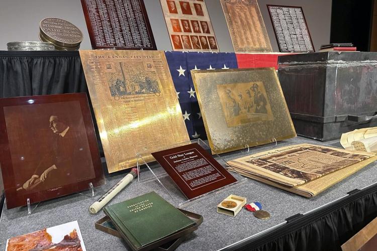 A century-old time capsule's contents are unveiled in Kansas City