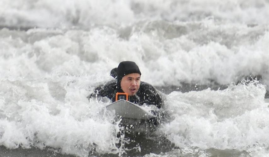 Surfing the pounding Lake Ontario waves
