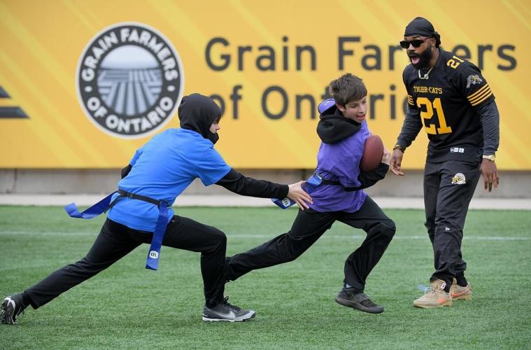 Ticats and kids have fun on the field