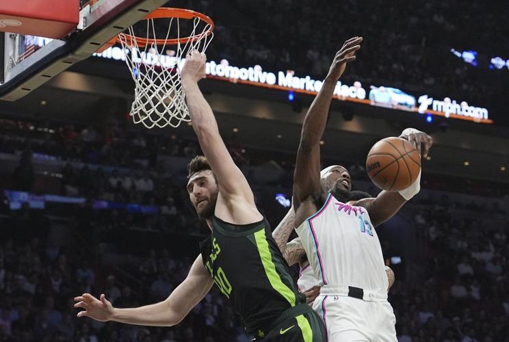 Jayson Tatum scores 33, Celtics hold Heat to 34% shooting and roll to ...