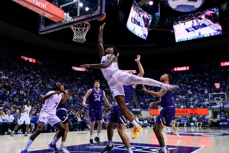 Richie Saunders scores 20 to lead No. 8 BYU to 98-53 victory over Holy ...