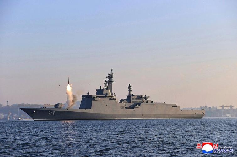 North Korea's Kim watches missile test-firings from country's first ...