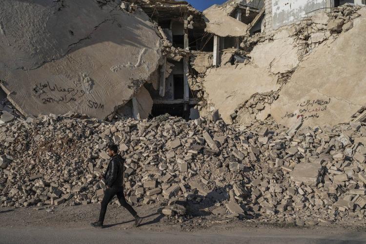 AP PHOTOS: In northern Syria, displaced owners return to houses with no ...