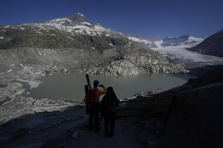 See photos of a Swiss glacier melting in the heat of climate change