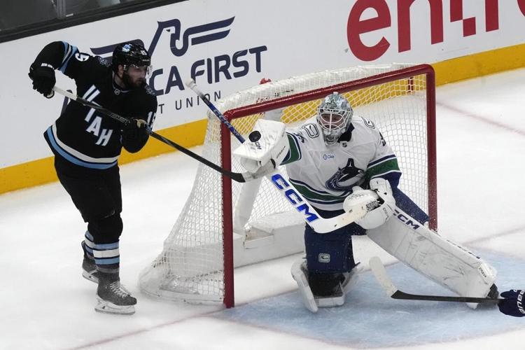 Mikhail Sergachev scores in OT to lift Utah over the Canucks 3-2