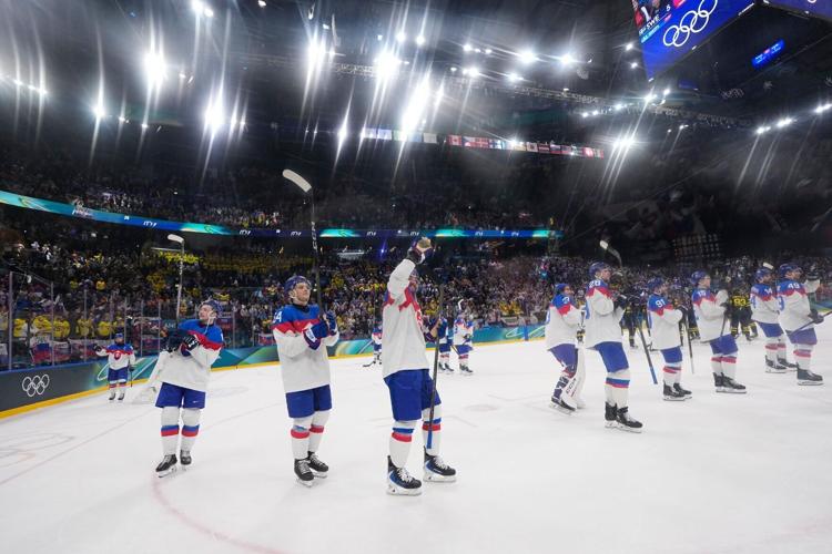 Late goal in a loss to Sweden gets Slovakia into the quarterfinals at ...