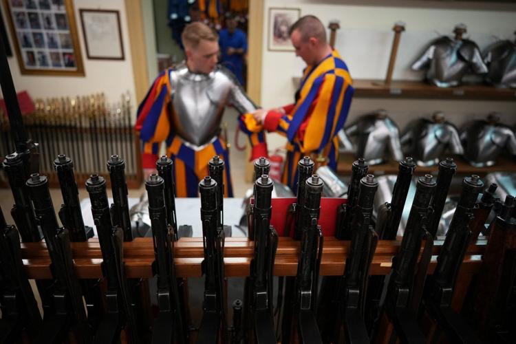 A look at Swiss Guards preparing for a swearing-in ceremony attended by ...