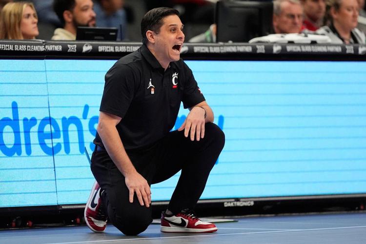 Cincinnati firing men's basketball coach Wes Miller, AP sources say