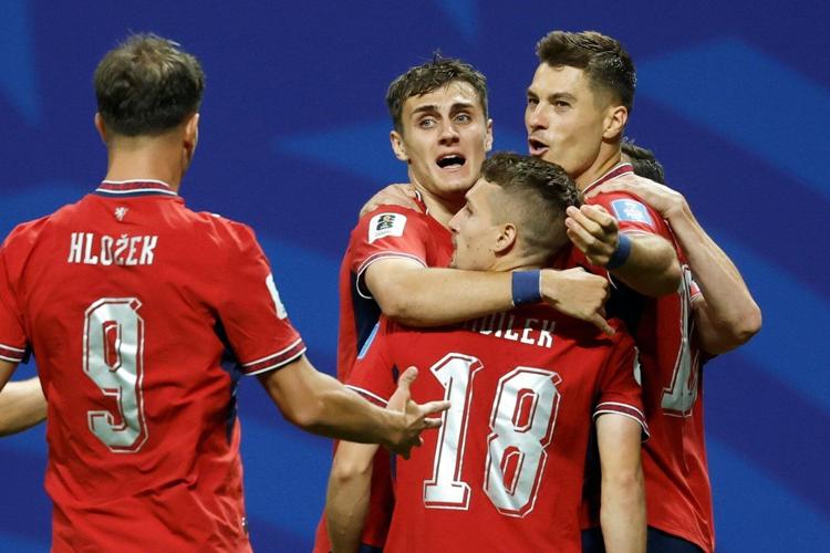 South Africa keeps its World Cup hopes alive with a 1-1 draw against ...