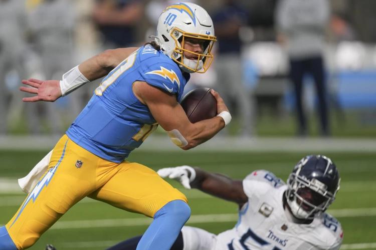 Justin Herbert has TDs passing and rushing as Chargers beat Titans 27 ...