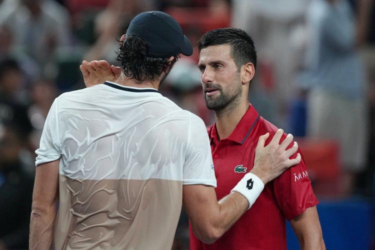 Family affair: 204th-ranked Vacherot stuns Djokovic and will face ...