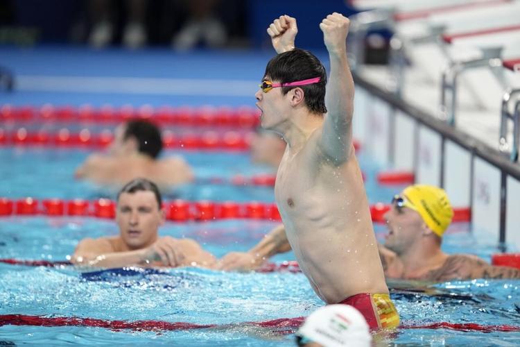 Pan Zhanle of China breaks own world record to win Olympic gold medal ...