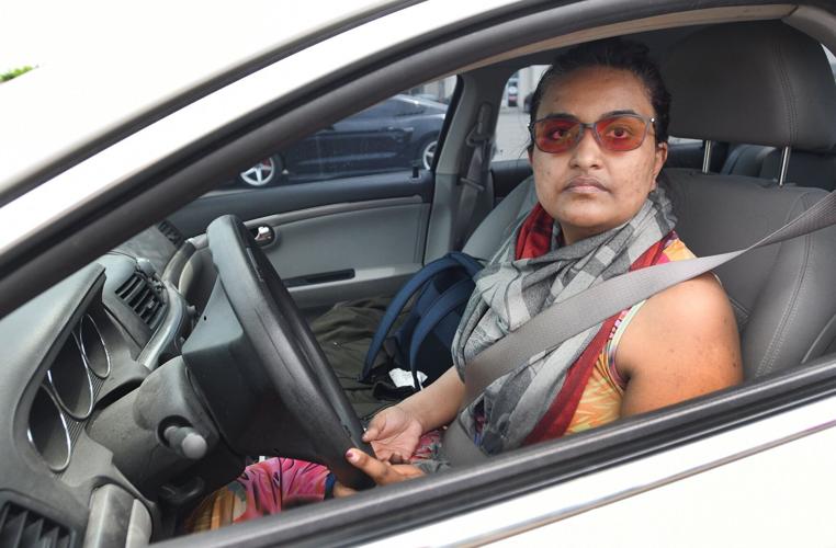 Woman homeless as tenants refuse to leave her new house