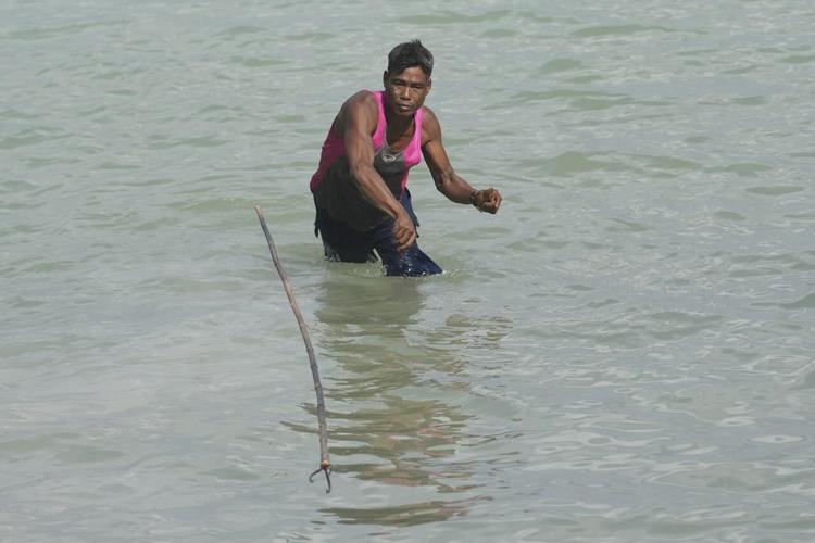 The water was their livelihood. Now Thailand's sea nomads work to ...