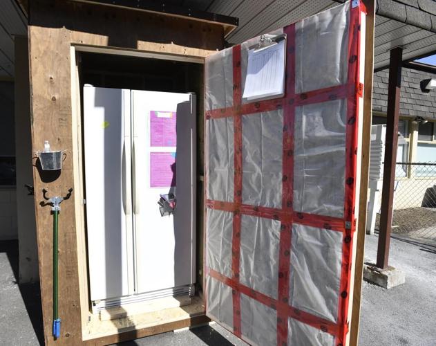 ‘We care about people’: Hamilton group opens outdoor community fridge