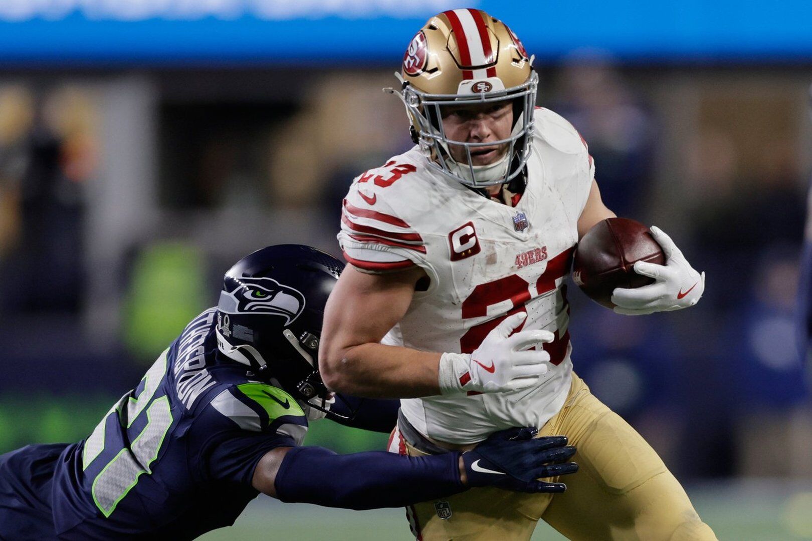 49ers star RB Christian McCaffrey injured in playoff game against ...