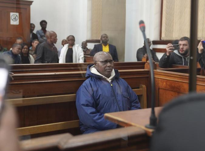Rwandan genocide suspect appears in court holding Bible after 22 years ...