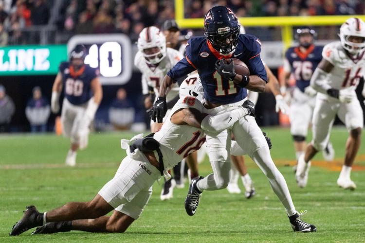 No. 17 Virginia tops Virginia Tech 27-7 to clinch a spot in ACC title game