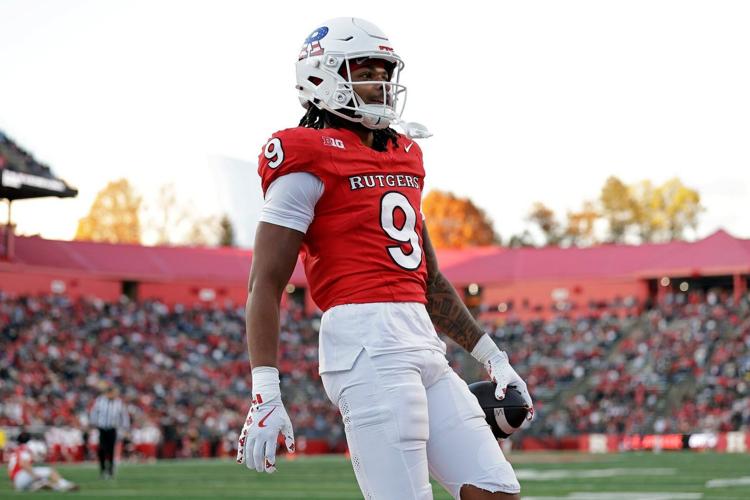 Antwan Raymond runs for 240 yards in Rutgers' 35-20 win over Maryland