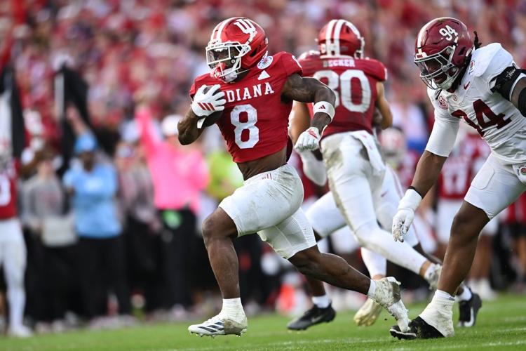 Strong ground games propel No. 1 Indiana and No. 5 Oregon to CFP ...