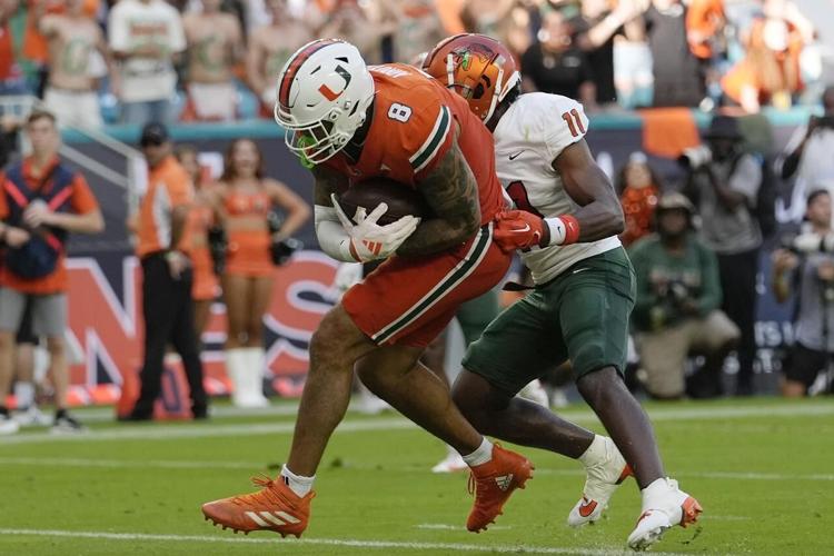 Cam Ward passes for 3 TDs, runs for another and No. 12 Miami rolls past ...