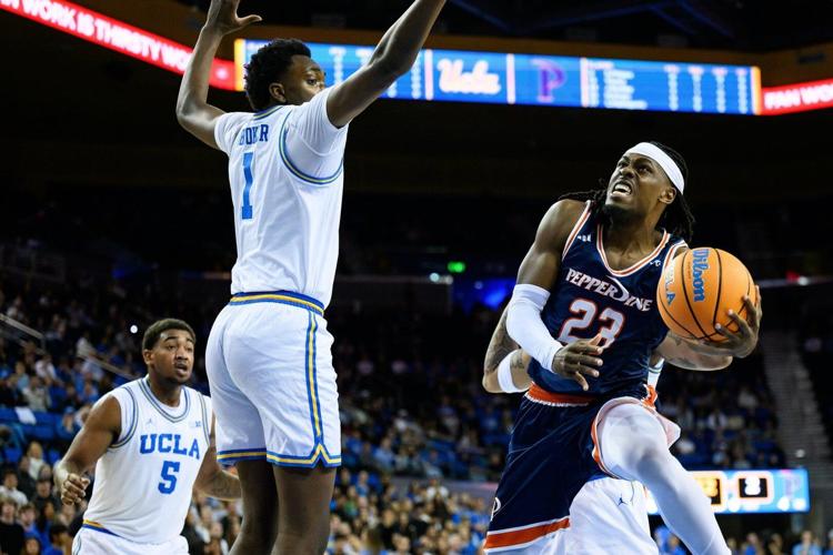 Xavier Booker leads No. 12 UCLA to 74-63 victory over Pepperdine with ...