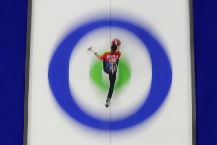 Controversy sweeps through curling at the Winter Olympics, in photos