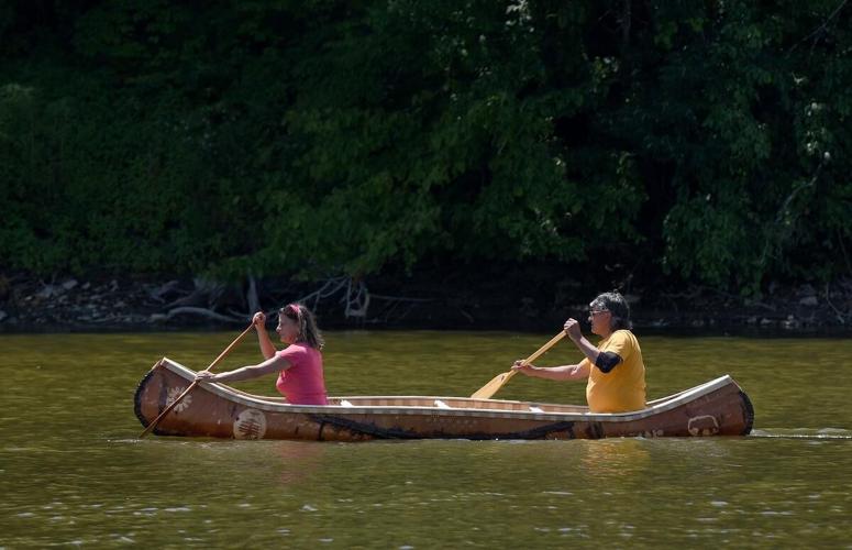 Creating a birch bark canoe at Mohawk College