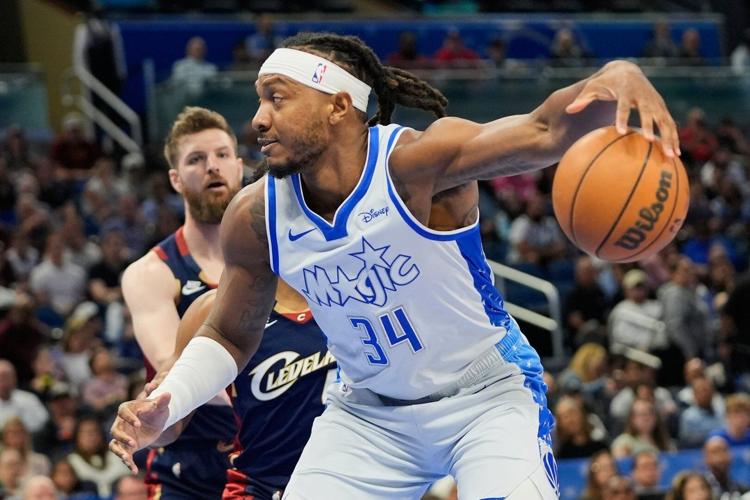 Desmond Bane scores 35 points to help the Magic beat the Cavaliers 128-122