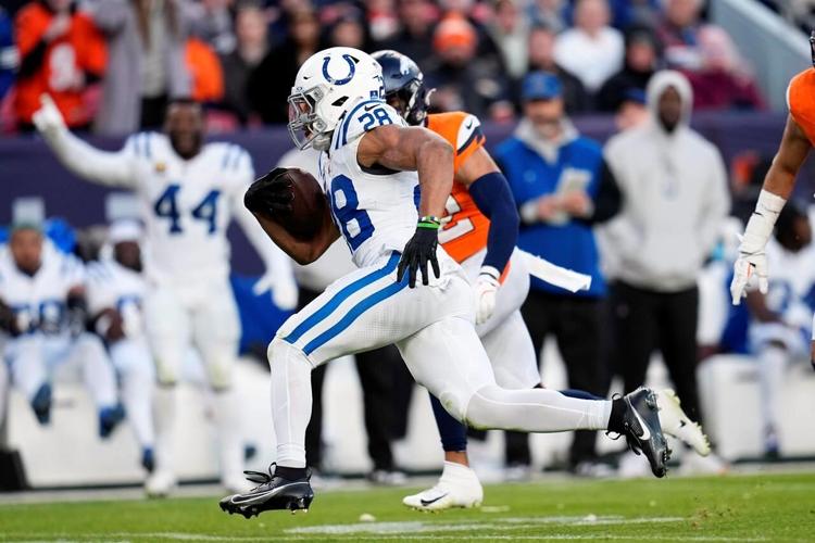 Cincinnati's Jordan Battle and Indy's Jonathan Taylor drop ball before ...