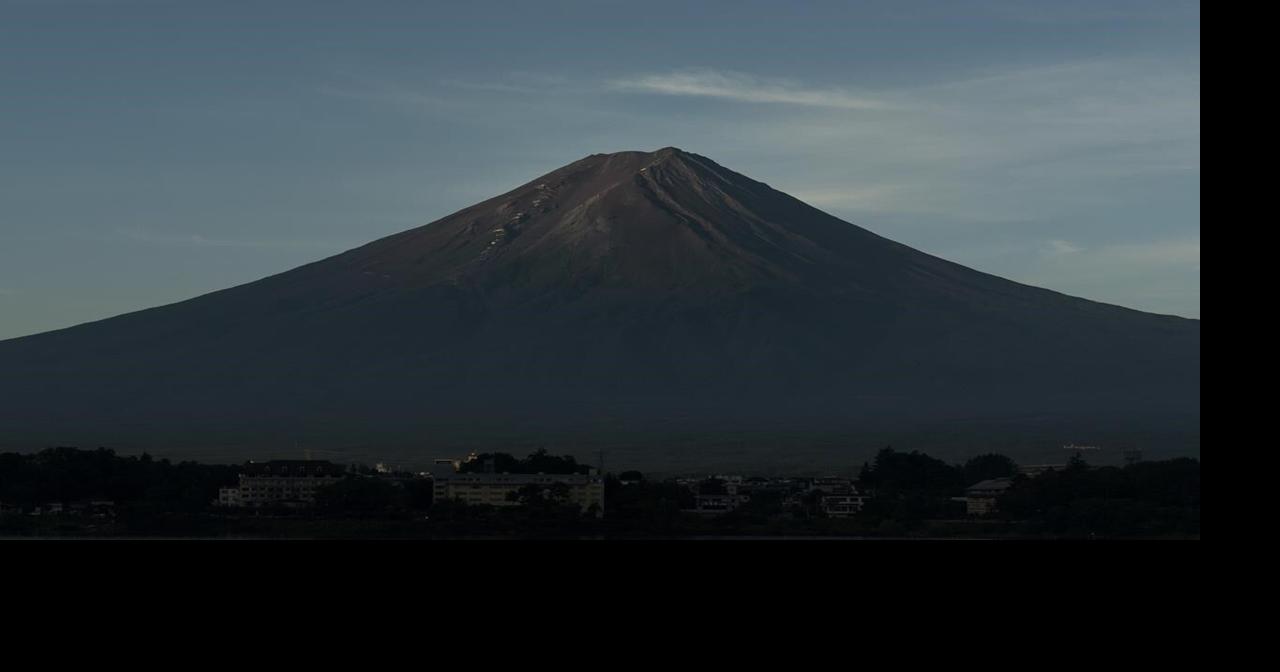 It's not official yet but Mount Fuji gets its trademark snowcap after ...