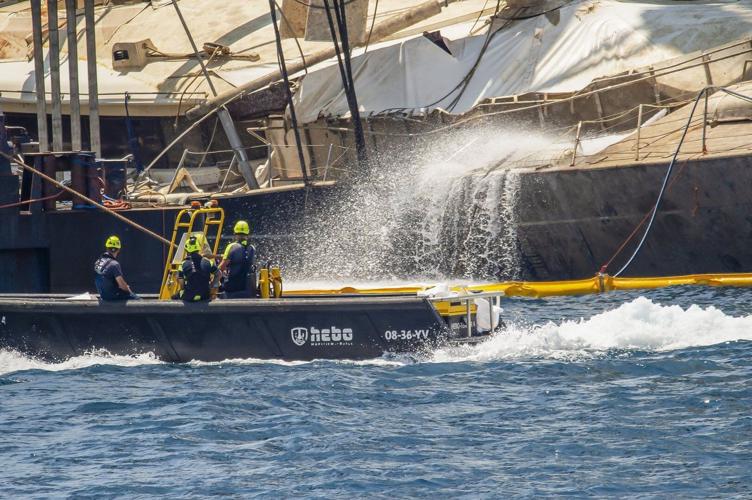 Sunken Bayesian superyacht lifted out of the water off Sicily as ...